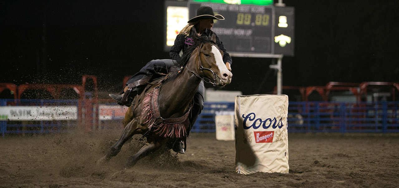 Cowgirl Barrel Racing | Steamboat Pro Rodeo